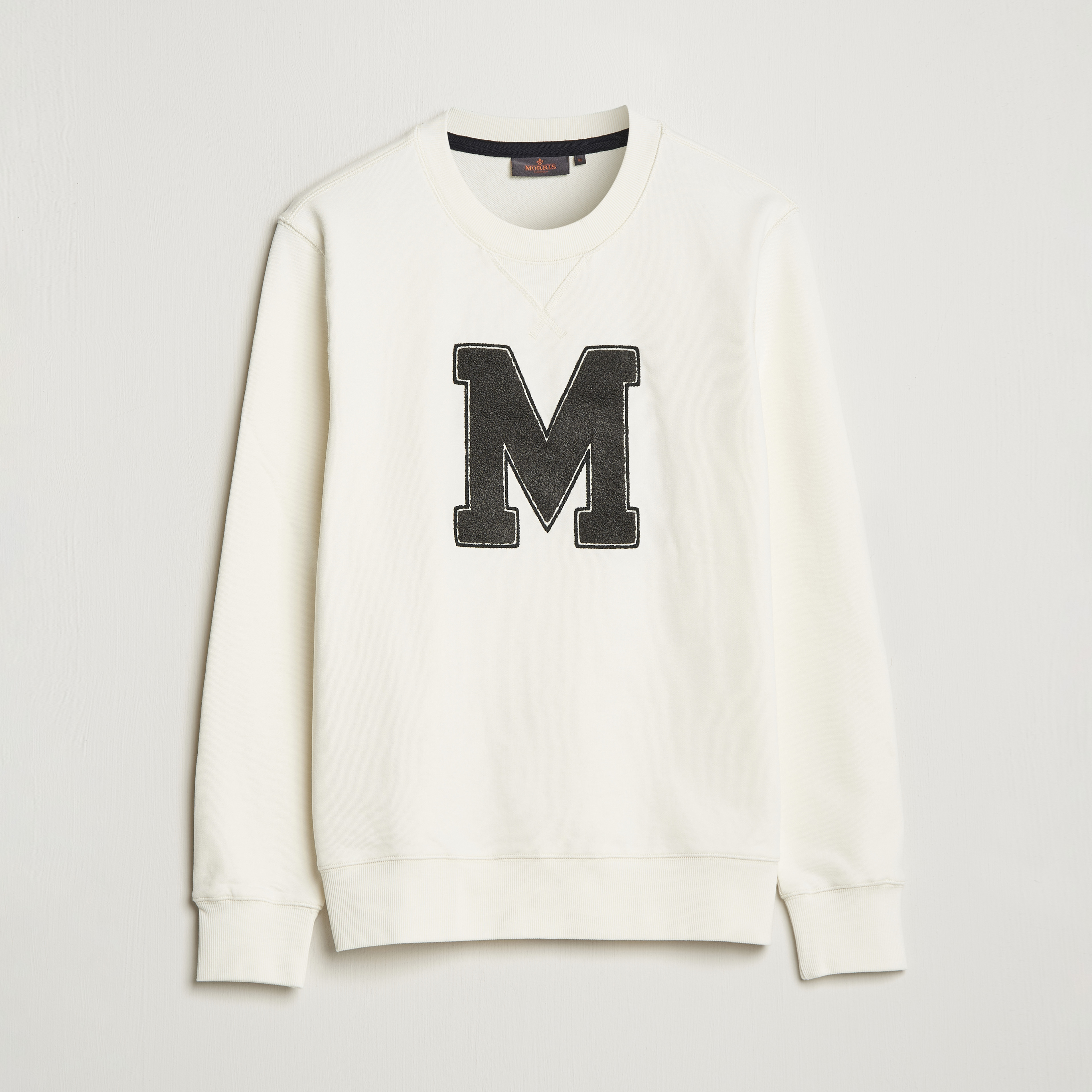 Morris Leoni Logo Sweatshirt Off White bei Care of Carl